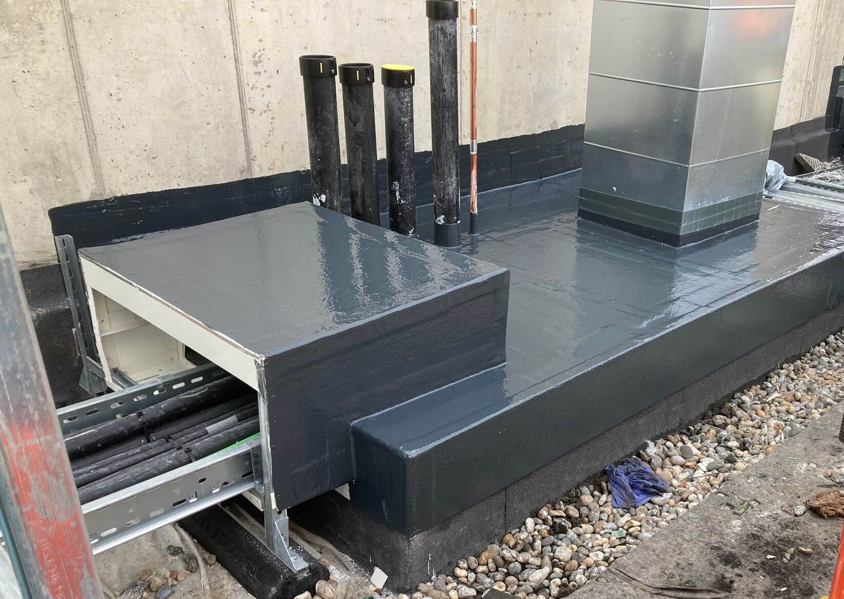 Service riser weatherproofing on mixed-use building in Camden | Jones ...